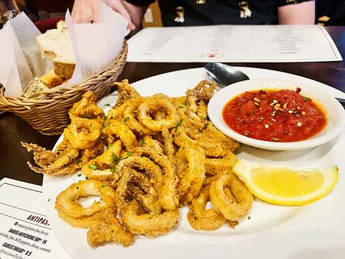 Golden fried calamari that's tender instead of rubbery, served with marinara that actually tastes like tomatoes.