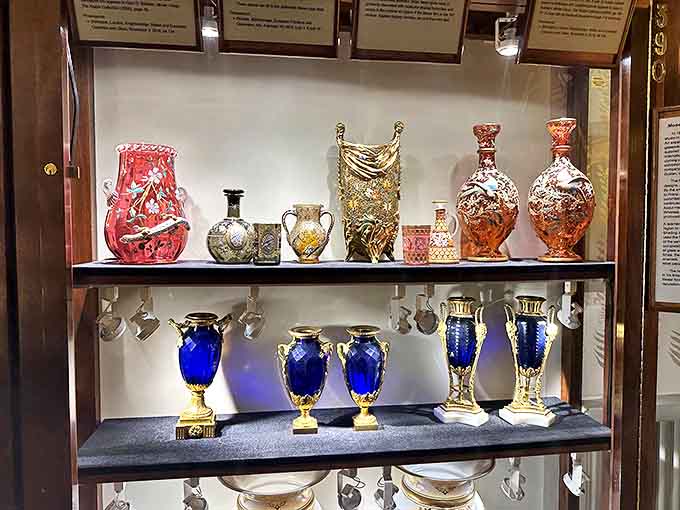 These antique Moser glass vases showcase the rich blues and golds favored by European royalty, their ornate designs practically begging for a bouquet worthy of their splendor.