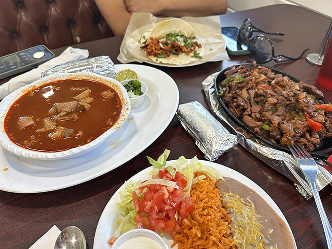 A feast for both eyes and stomach – rich menudo alongside sizzling fajitas and a taco that's dressed for success with fresh toppings.