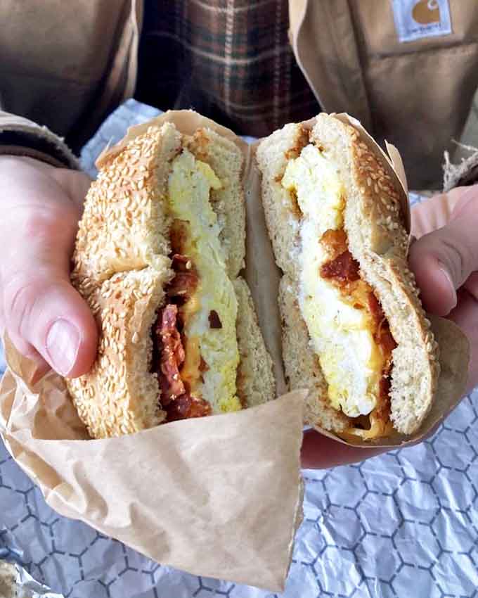 The bacon, egg, and cheese bagel that sets the gold standard for breakfast sandwiches everywhere, proving that simple ingredients become extraordinary when someone actually cares about the results.