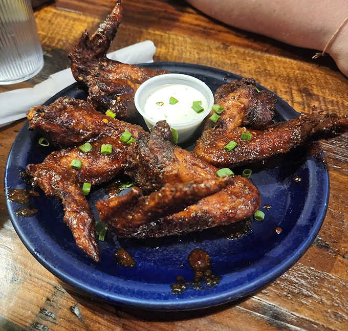 Forget everything you thought you knew about wings &ndash; these smoke-kissed beauties redefine finger-licking good.