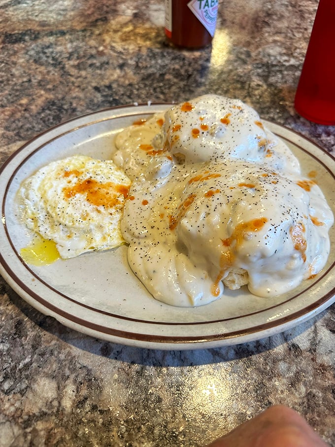 Fluffy islands of dough swimming in a peppery sea of sausage gravy &ndash; the breakfast that launched a thousand naps.