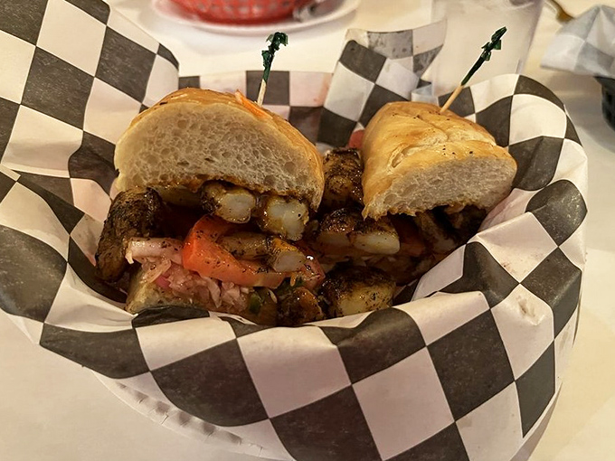 Cajun-spiced shrimp tucked into a pillowy roll with the perfect veggie crunch &ndash; portable New Orleans at its finest.