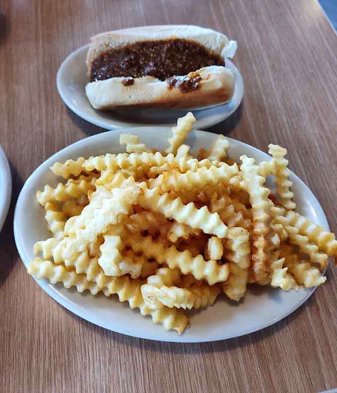 Golden crinkle fries and a chili dog prove that sometimes the classics are classic for a reason.