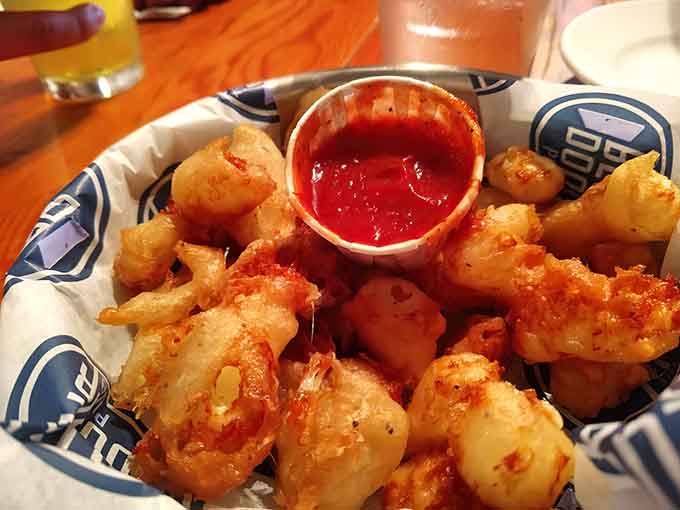 That marinara dipping sauce isn't just an accessory, it's the perfect tangy companion to rich, gooey fried cheese.