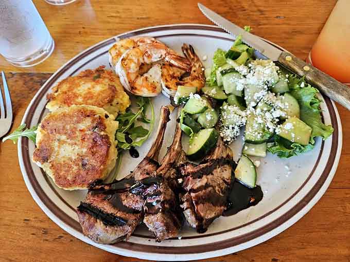 When the kitchen sends out crab cakes, perfectly grilled lamb, and succulent shrimp on one plate, you know someone back there really likes you.