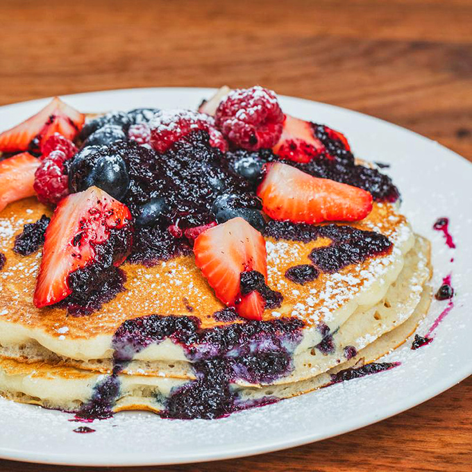 Berry-laden pancakes that look like they're auditioning for a food magazine spread &ndash; and absolutely nailing the part.