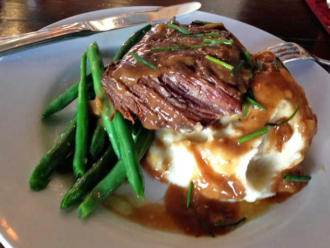 The perfect bite: fork-tender beef, vibrant green beans, and that sauce that'll have you contemplating drinking it straight.
