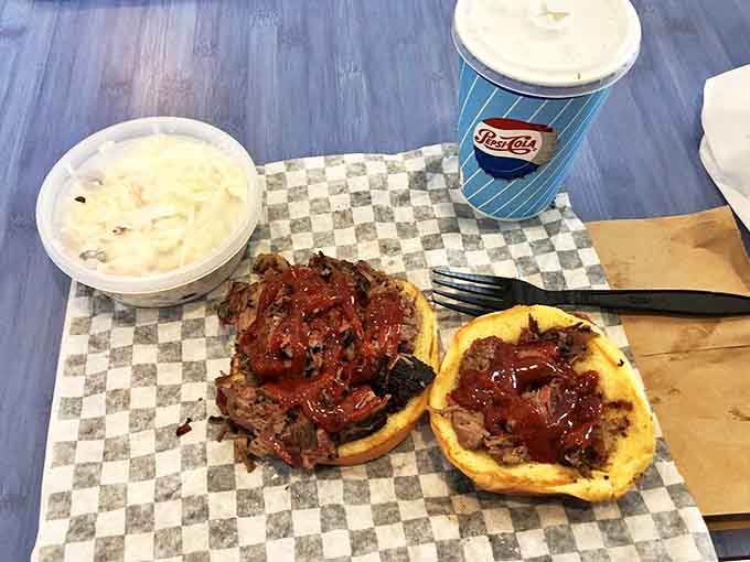 That glistening brisket paired with creamy coleslaw is the kind of combination that makes you understand why people drive from neighboring towns.