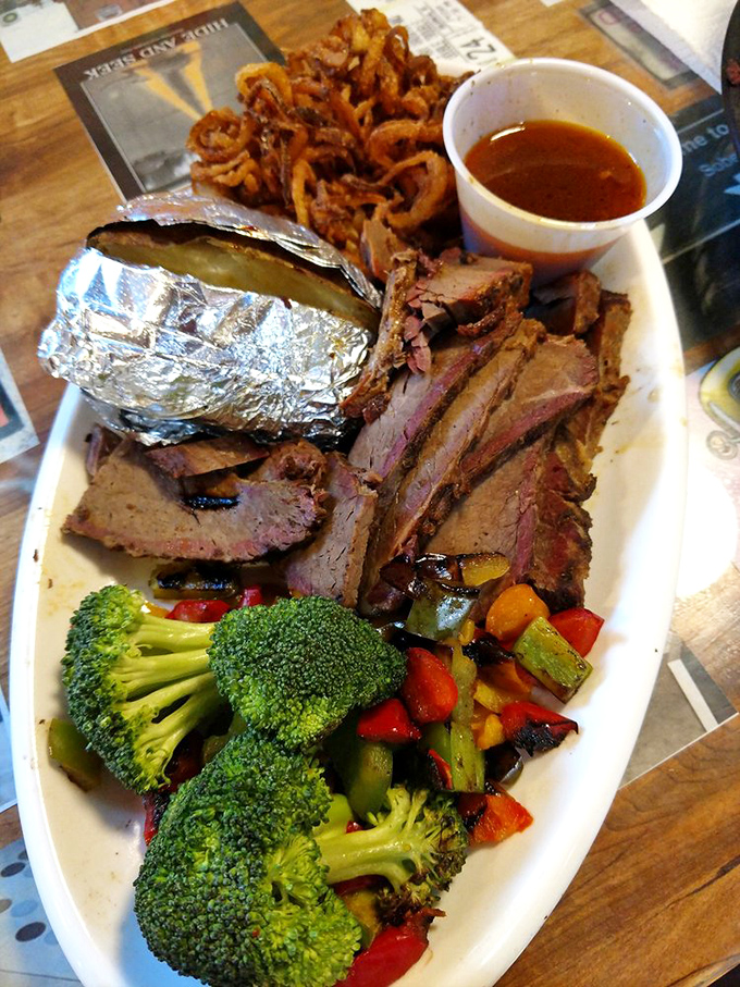 Smoke ring perfection! This brisket has been slow-dancing with hickory smoke so long it practically melts on your fork.