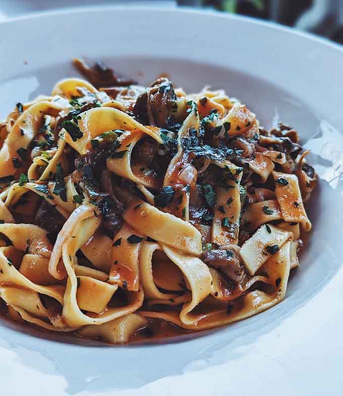 Rich, meaty sauce clings to tender ribbons of pasta like it's got nowhere else to be.