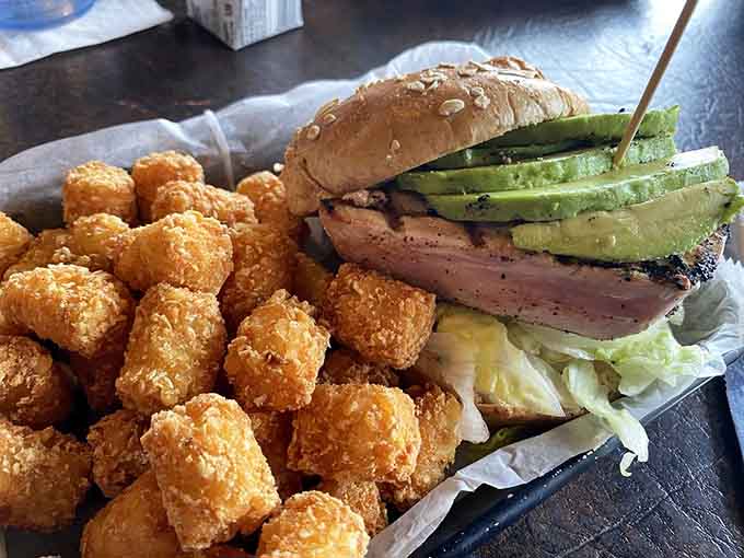Blackened ahi tuna meets perfectly crispy tater tots, proving this place handles seafood as well as comfort classics.