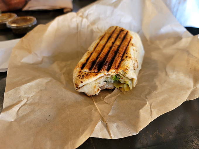 A cross-section reveals the artful distribution of ingredients &ndash; each component visible yet harmoniously integrated with its neighbors.