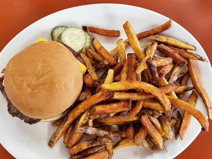 Hand-cut fries with that perfect crisp-outside-fluffy-inside texture prove that sometimes the simplest foods, done right, are the most satisfying.