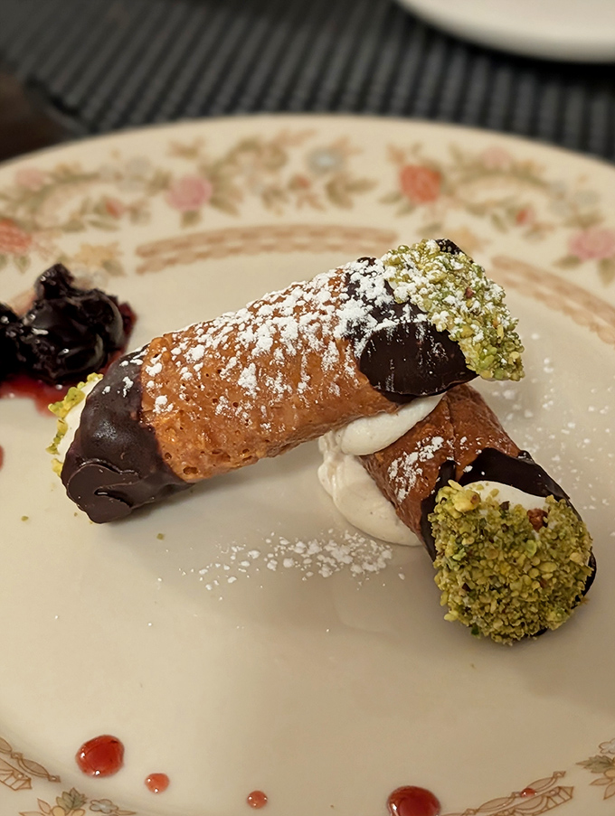 Chocolate-dipped cannoli with pistachio crumble and a dollop of cream &ndash; proof that Italian traditions and Maine ingredients make delicious partners.
