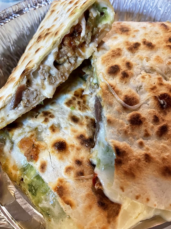 Carnitas and melted cheese create the ultimate comfort food marriage in this perfectly griddled quesadilla that oozes with each bite.