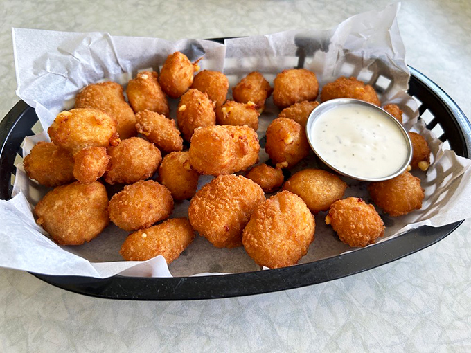Golden nuggets of joy – these cheese curds squeak between your teeth in that distinctly Wisconsin way that says "authenticity guaranteed."