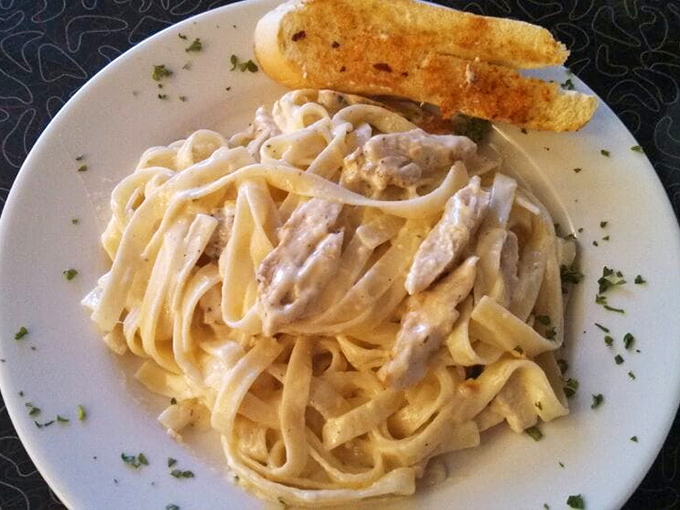 Fettuccine Alfredo that doesn't apologize for its richness &ndash; creamy, indulgent pasta that your grandmother would approve of and your doctor might question.