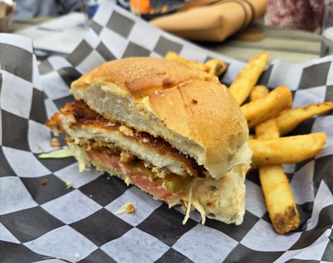 This sandwich isn't just lunch &ndash; it's an architectural masterpiece of flavors stacked between perfectly toasted bread.