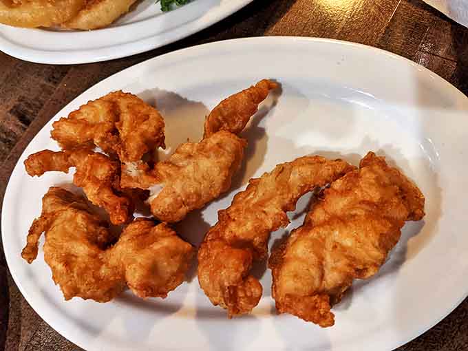 These aren't ordinary chicken tenders &ndash; they're the Chicken George, hand-battered treasures that have locals crossing county lines just for a bite.
