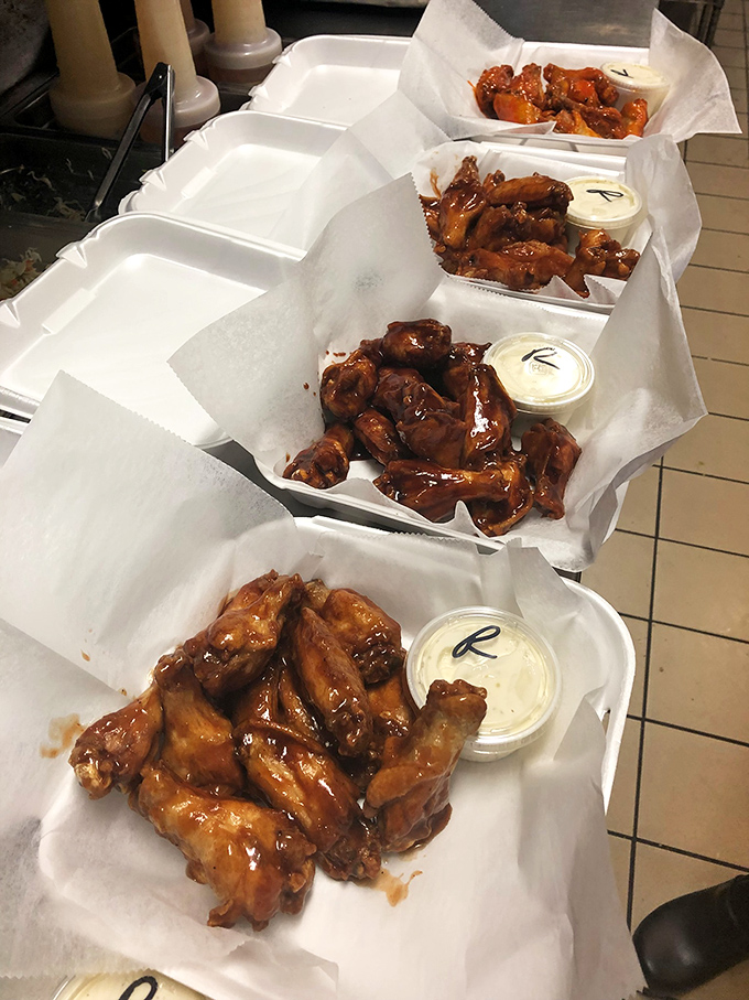 These aren't just wings&mdash;they're flavor vehicles delivering saucy perfection with each bite. Notice how the sauce clings lovingly to every morsel.