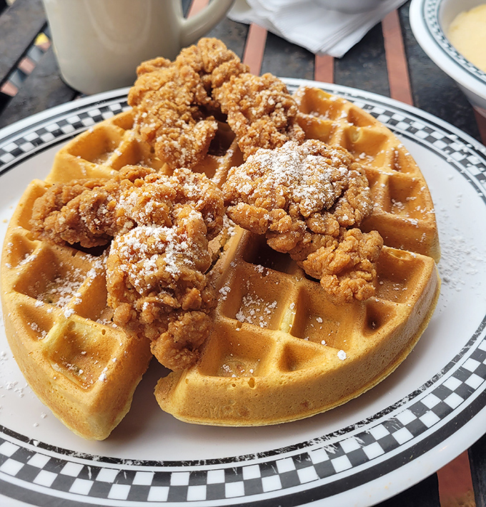 The chicken and waffle situation here is serious business. Crispy chicken perched atop a fluffy waffle &ndash; it's breakfast architecture at its finest.