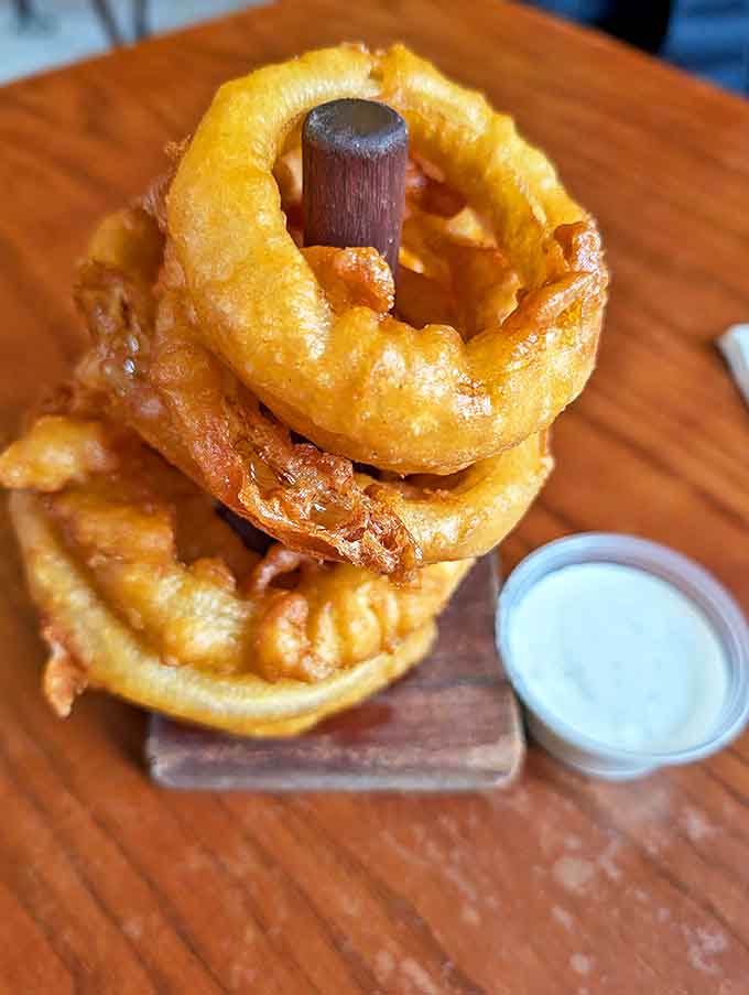 Golden hoops of joy stacked like delicious bracelets, these hand-dipped beauties have achieved legendary status among Michigan food lovers for good reason.