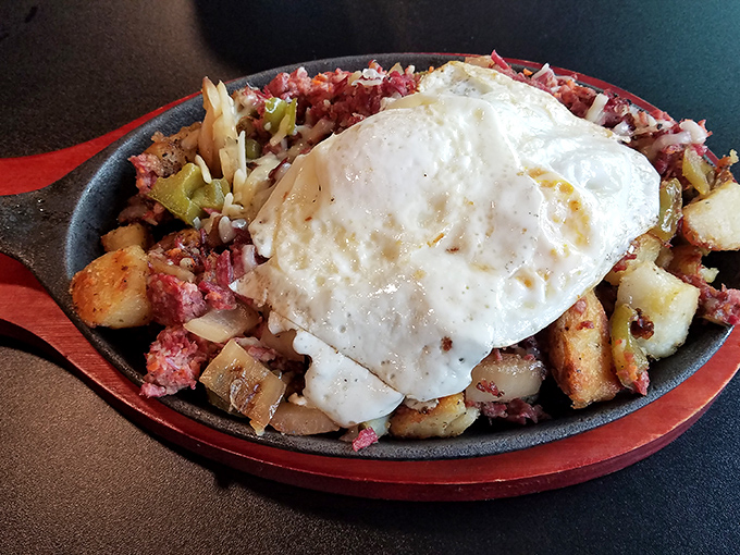 The holy grail of breakfast &ndash; house-made corned beef mingling with potatoes under a perfect sunny-side egg.