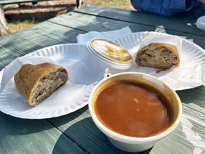Golden-brown perfection on a paper plate &ndash; these beef pasties with gravy showcase the simple, hearty meal that's been drawing crowds for generations.