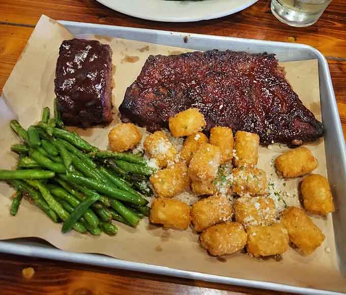 Ribs and steak team up with tater tots like the Avengers of comfort food, ready to save your appetite.