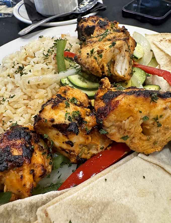 Lebanese rice and grilled vegetables join forces with tender chicken to create a plate that looks as good as it tastes.