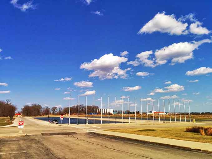 These empty flagpoles stand ready for their patriotic duty, creating an oddly compelling visual that hints at ceremonies and celebrations yet to come.