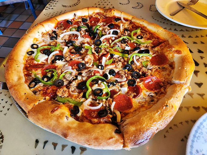 "The Major" pizza showcases Satchel's commitment to abundance, with toppings arranged in a delicious mosaic of colors and textures.
