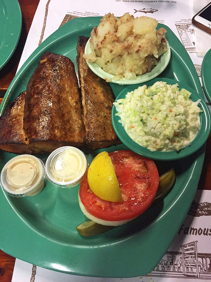 The full dinner spread showcases Ted Peters' commitment to quality &ndash; that gorgeous smoked fish paired with homestyle sides creates flavor harmony.