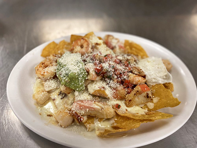 Nachos del Mar transforms the humble chip into a vehicle for seafood happiness that defies all snacking logic.