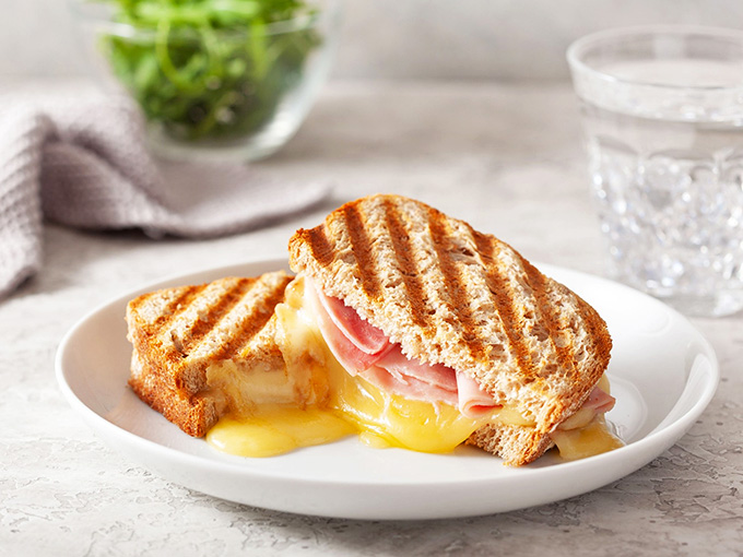 The grilled ham and cheese delivers melty, gooey satisfaction that would make even the pickiest eater weak in the knees.