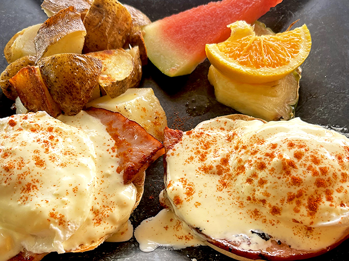 Eggs Benedict elevated to art form &ndash; hollandaise sauce cascading over perfectly poached eggs like a sunrise over Minnesota lakes.