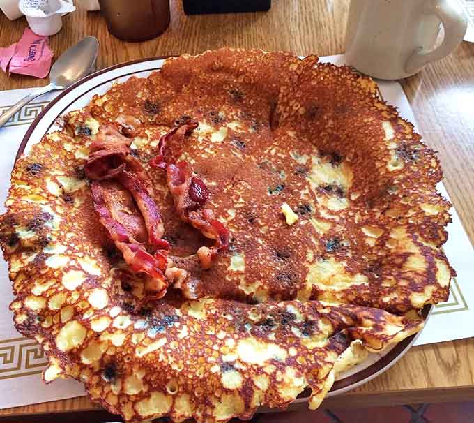 This Finnish pancake with blueberries showcases the perfect crispy edges and custardy center that makes pannukakku worth traveling for.