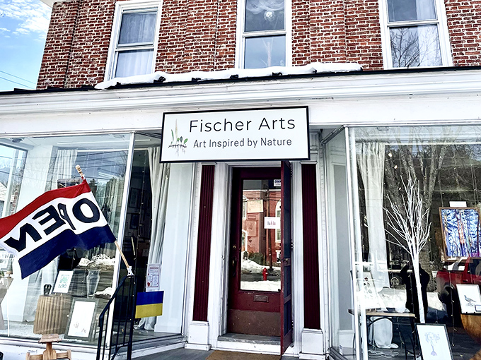 The welcoming entrance of Fischer Arts hints at Vermont&rsquo;s creative spirit, inviting visitors to step inside and discover nature-inspired masterpieces crafted by local hands.