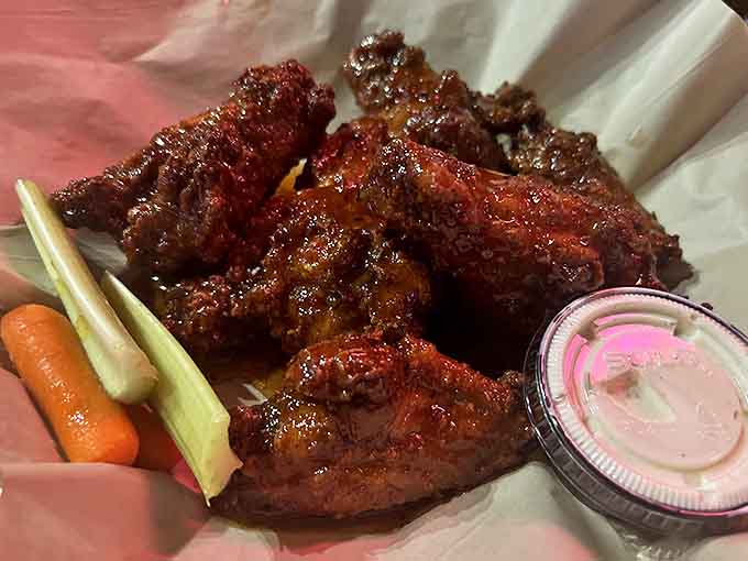Slathered in their signature sauce, these wings deliver a flavor explosion that'll have you plotting your return visit before the plate is empty.