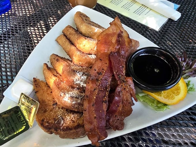 The perfect breakfast harmony: crispy-edged French toast with a side of perfectly cooked bacon&mdash;proof that sweet and savory belong together.