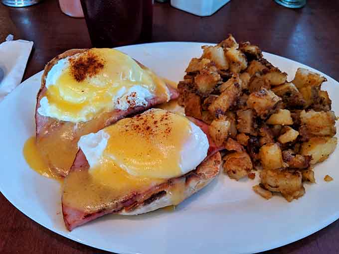 Eggs Benedict done right, with hollandaise so silky it practically glides onto your fork, perched atop Canadian bacon and English muffins.