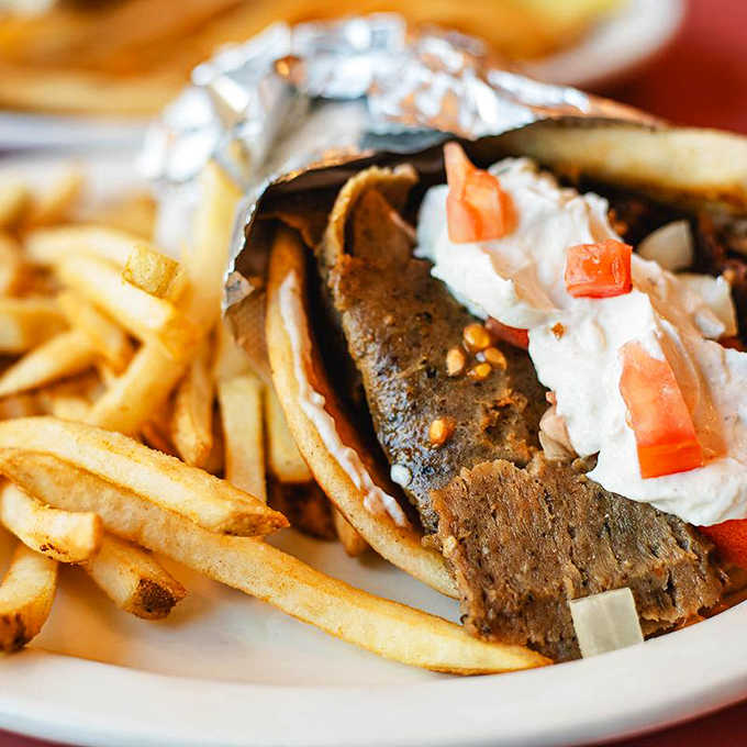 This isn't just a sandwich&mdash;it's a masterpiece of meat, wrapped in warm pita and dressed with tzatziki that could make Greek gods jealous.