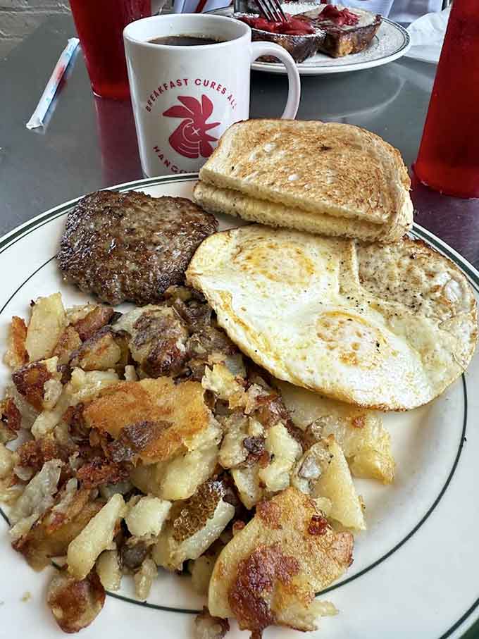Classic breakfast done right: eggs, sausage, hash browns, and toast that actually tastes like something.