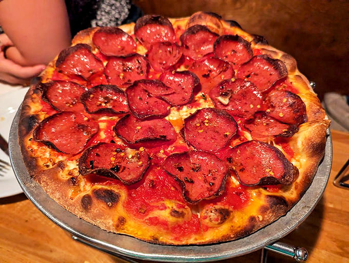 Hot salami and dried chili pepper create a heat symphony that dances across your taste buds without overwhelming them.