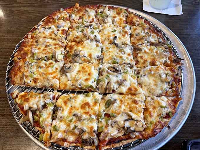 Loaded pizza that proves they haven't forgotten their namesake specialty after all these years.
