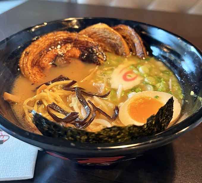 That perfectly jammy egg yolk and tender pork belly make this bowl look like edible art you almost hate to disturb.