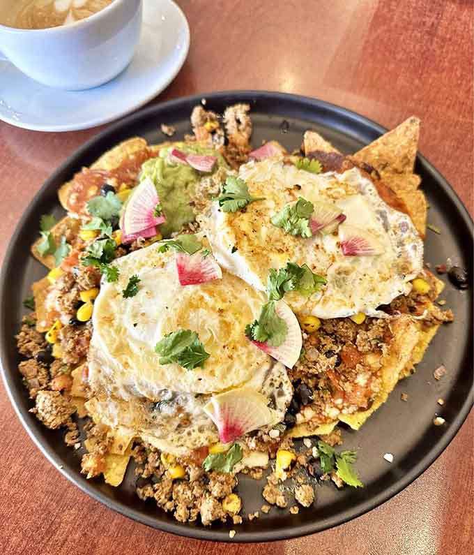 Chilaquiles that bring the heat and the flavor, proving breakfast doesn't have to be boring to be satisfying.