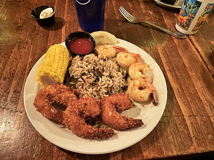 These jumbo shrimp are having their glamour moment, crispy, plump, and perfectly paired with rice that's been taking notes from the cowboys.