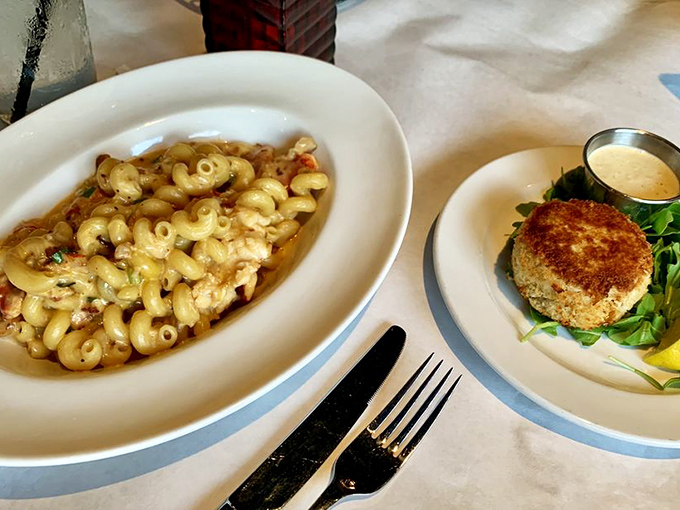 The dynamic duo that dreams are made of – velvety lobster mac and cheese alongside a golden-brown crab cake that's actually filled with crab!